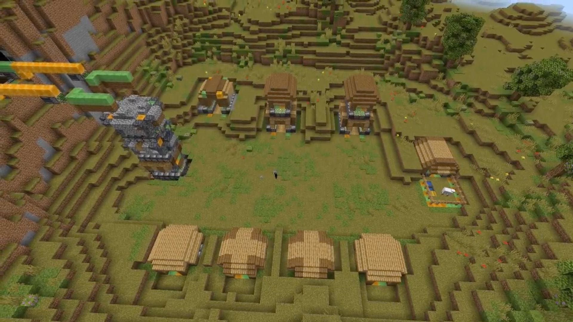 Minecraft player uses flying machines to hide a village